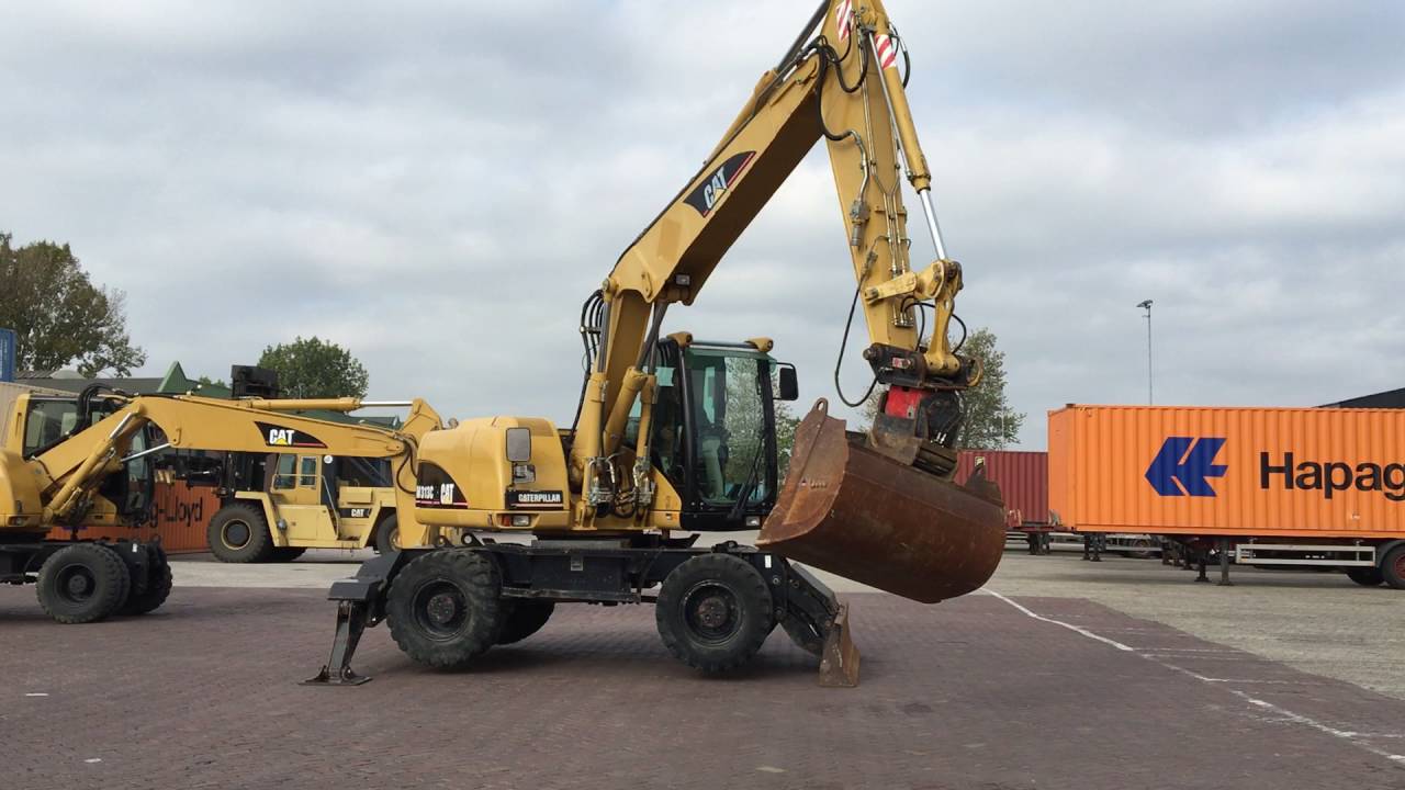 CAT M313C wheeled excavator test-drive @Holland Machinery - YouTube