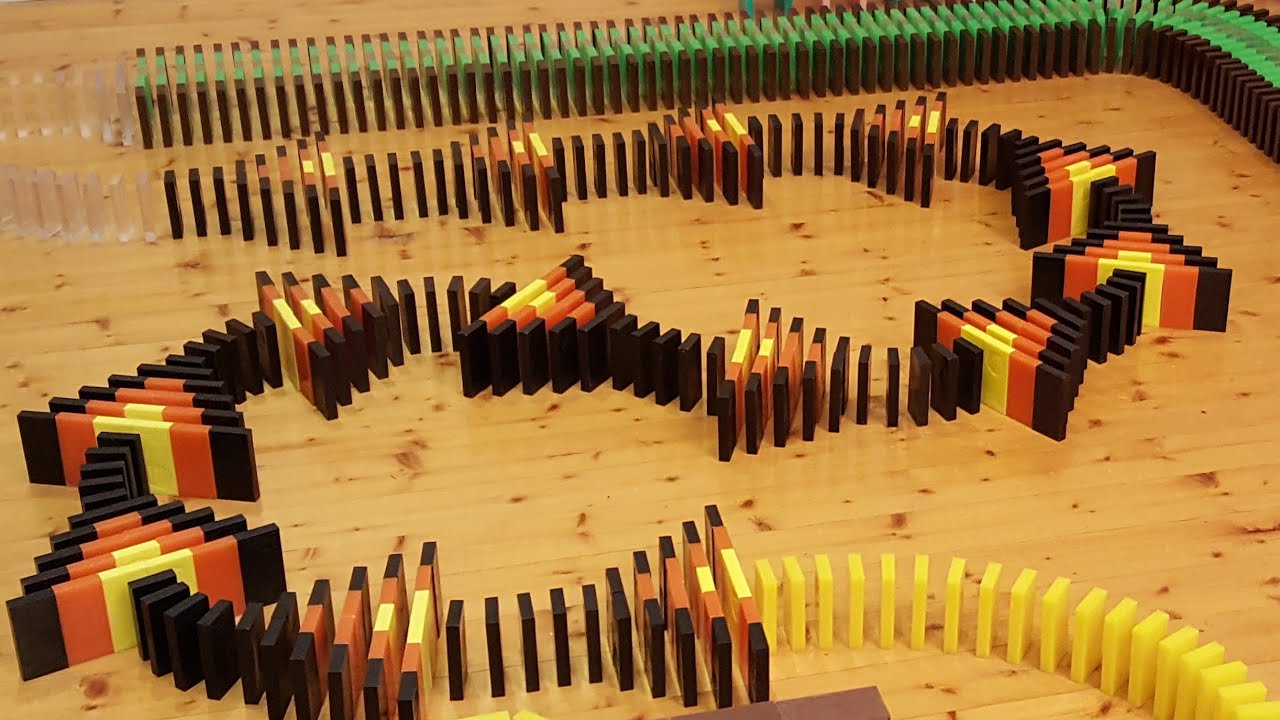 3000 dominoes in one setup containing a splitting speed wall, a ...