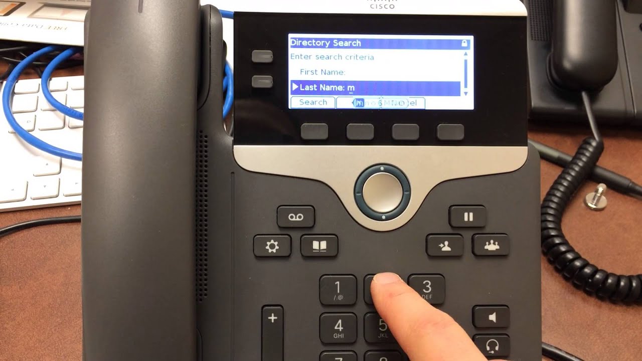 Finding a staff member's phone extension using the corporate directory ...