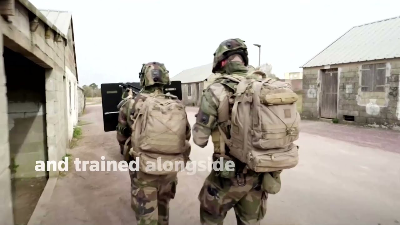 French cadets train alongside robots - YouTube
