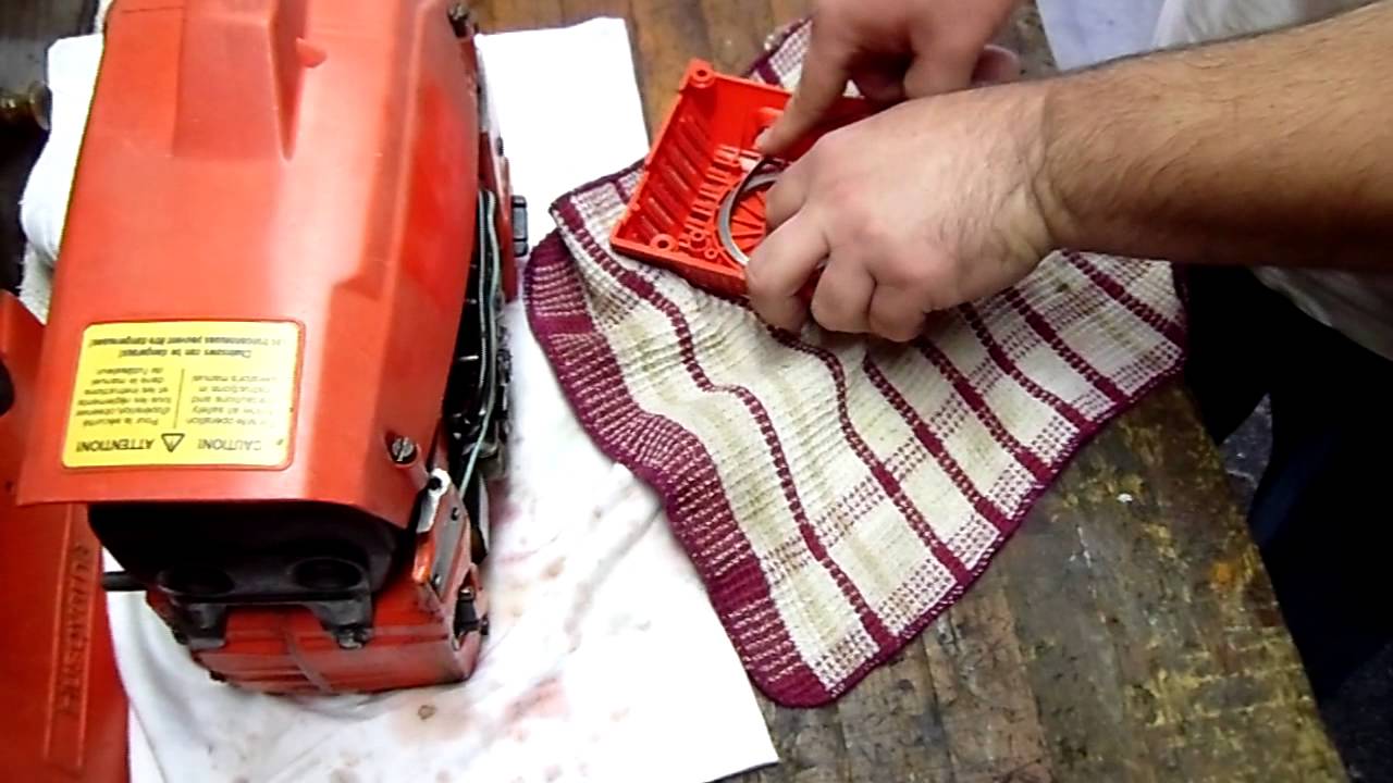 one way to put a spring back in to a pull start - YouTube