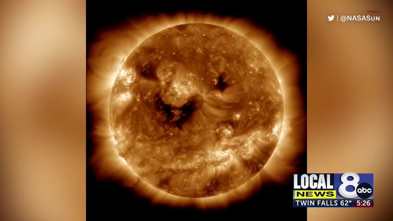 Eerie image of the sun 'smiling' captured by NASA - YouTube