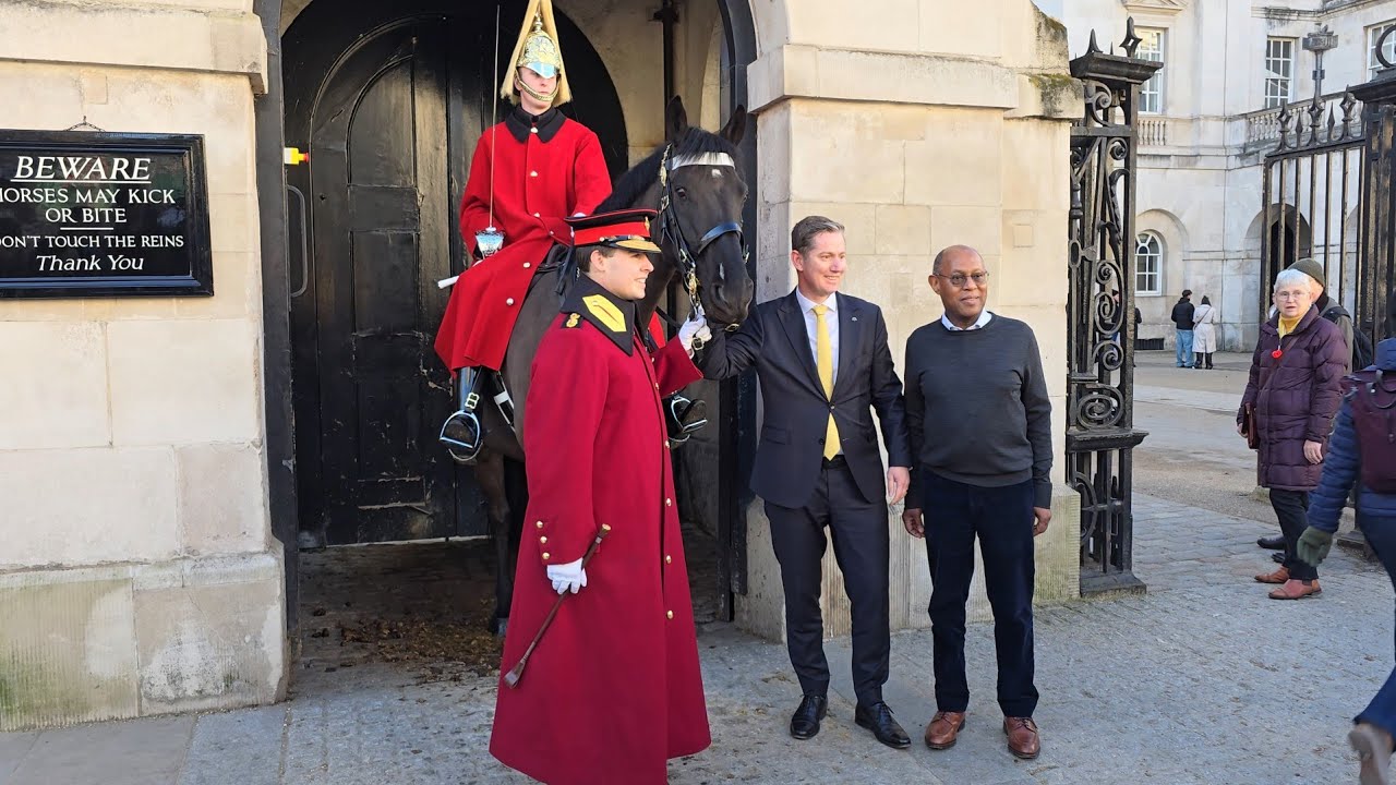 Captain of the King's Life Guards pose for photos next to the Majestic ...