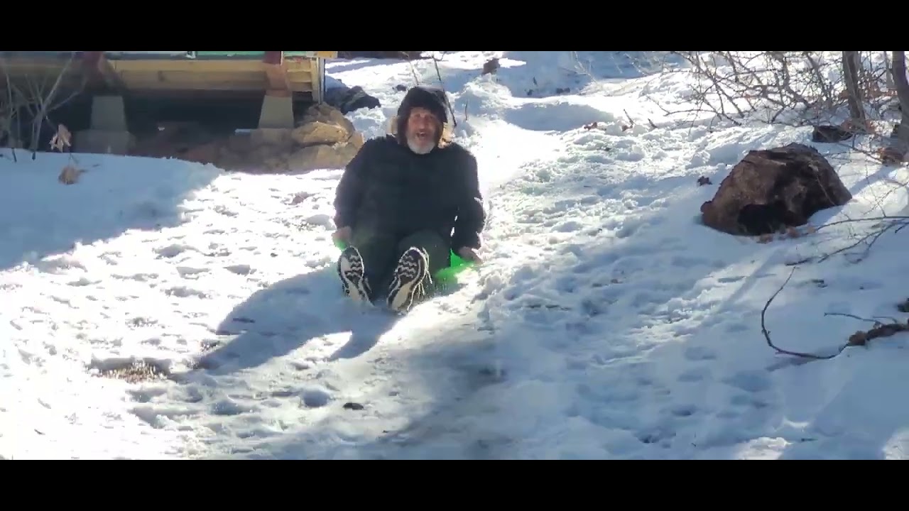 mike's snow disc bunny hop - YouTube