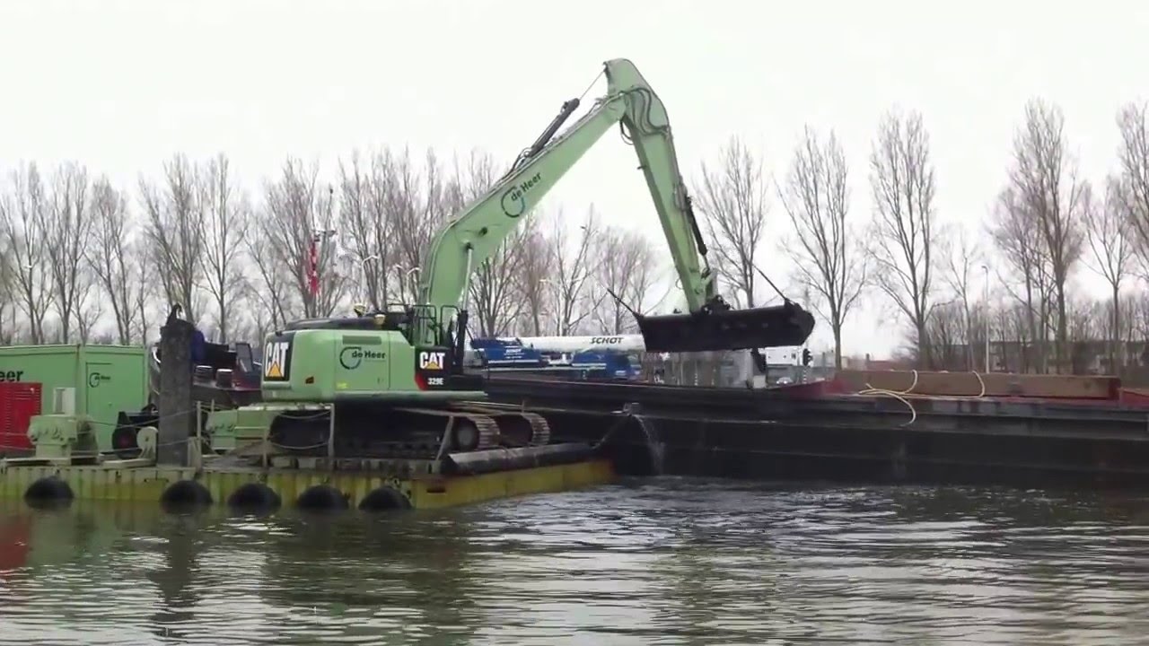 Caterpillar 329e De Heer - YouTube