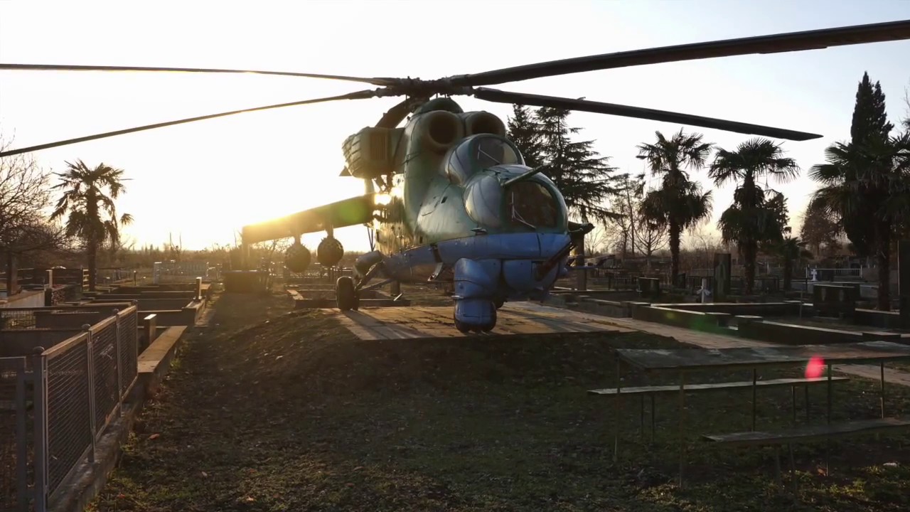 A helicopter in a cemetery - YouTube