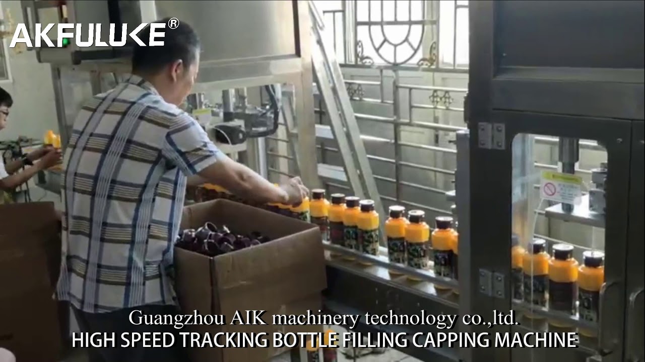 Automatic double head tracking filling machine - YouTube