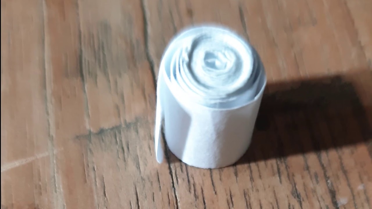 Unwinding paper roll - YouTube