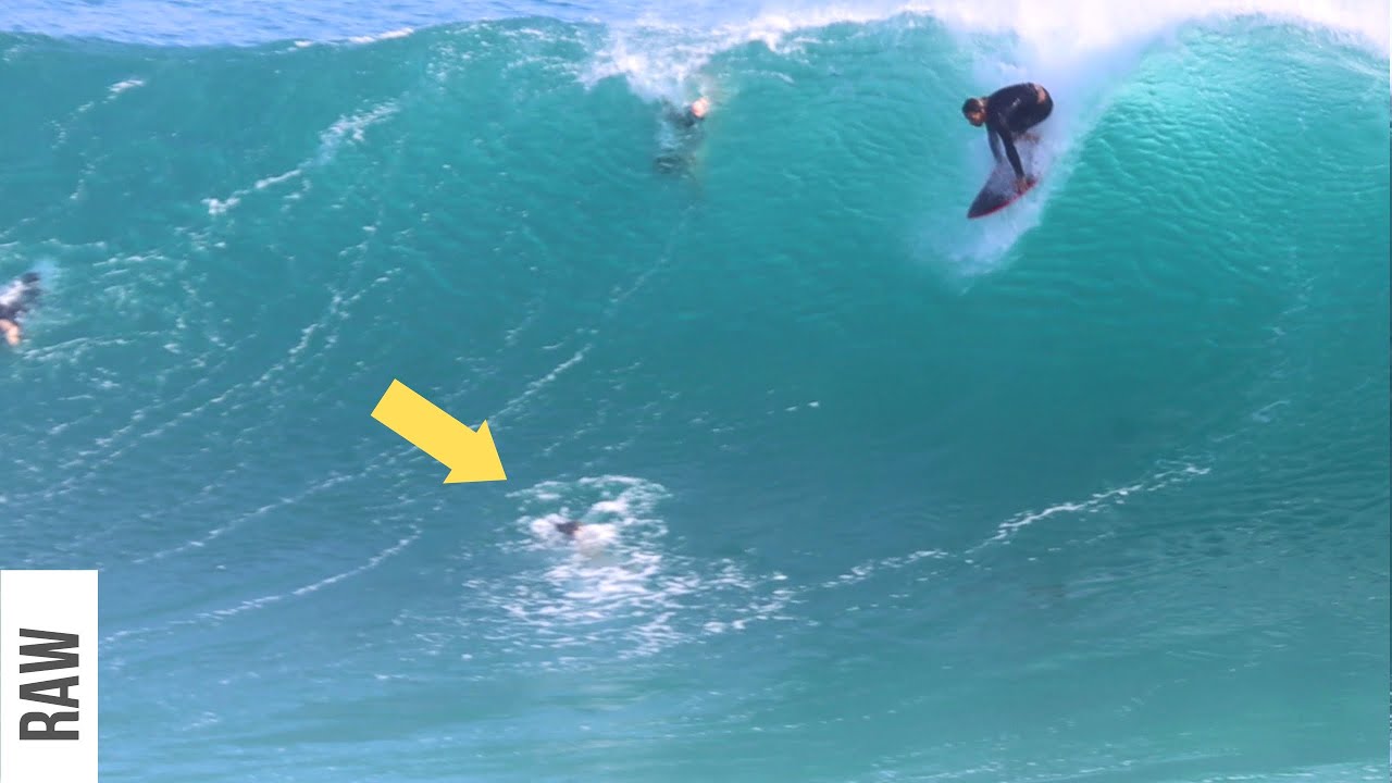Dude Poo-Shoots his Board into another Surfer (and pays the price ...
