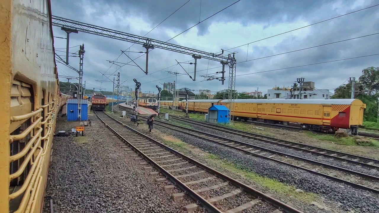 Ernad Express arrives at Mangaluru Central on a rainy evening - YouTube