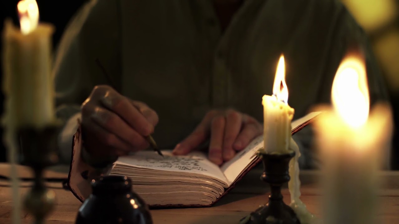 closeup of 1830 man writing in his diary by candlelight 4k slkxcumxg ...