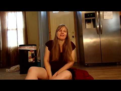 Voluptuous blond ALICIA AROL sits on her kitchen floor & talks to you before being interrupted...