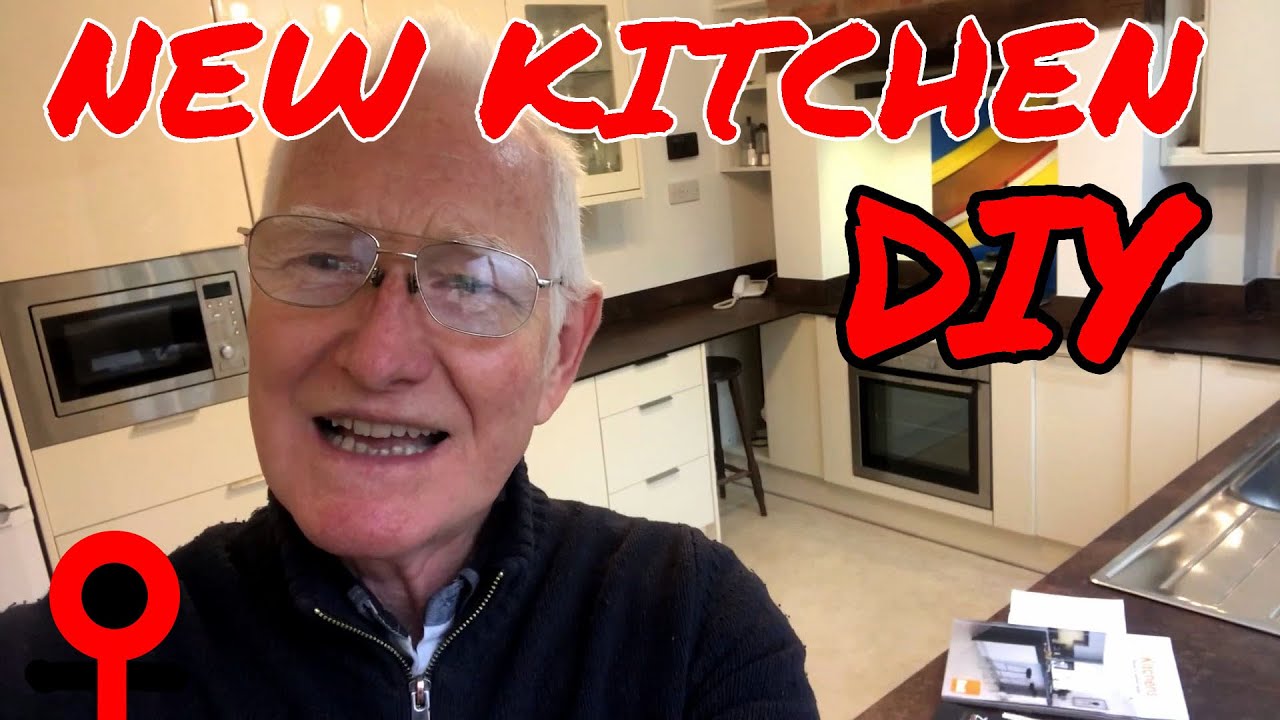 New kitchen DIY installation of B&Q flat pack cupboards and compact ...