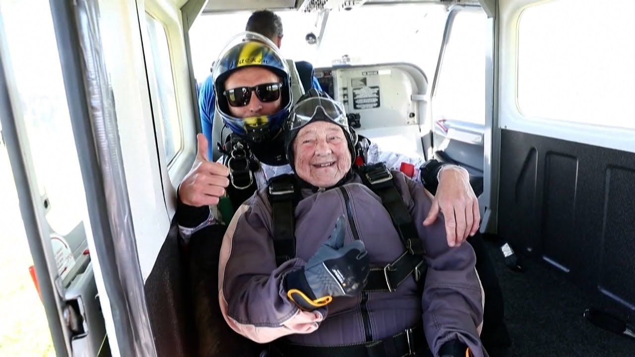 Daredevil granny, 103, beats record for oldest parachute jump - YouTube