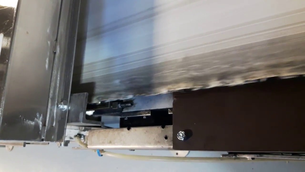 Frayed conveyor belt before trimming - YouTube