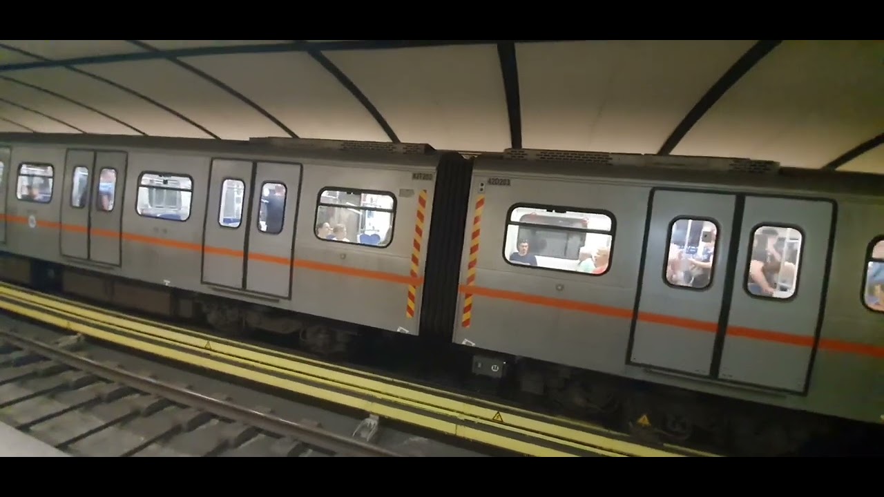 2nd generation train arriving and departing Syntagma station (line 3 ...