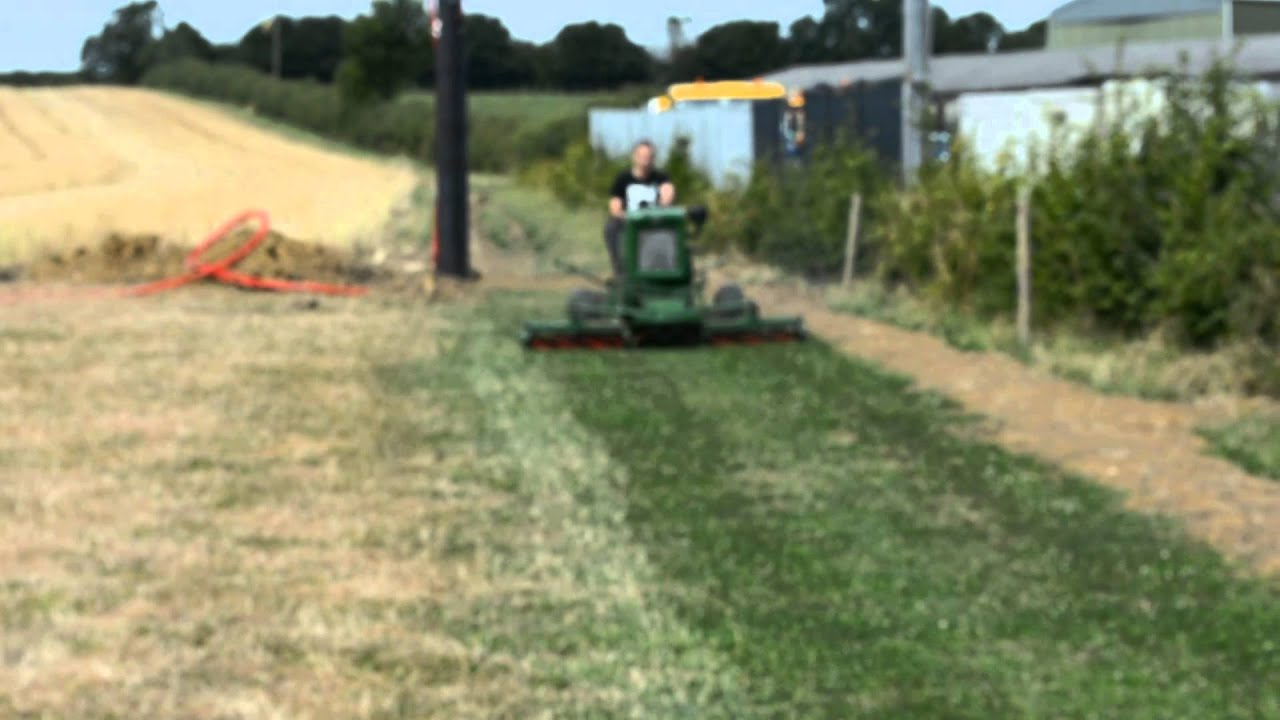 Ransomes triple ride on mower - YouTube