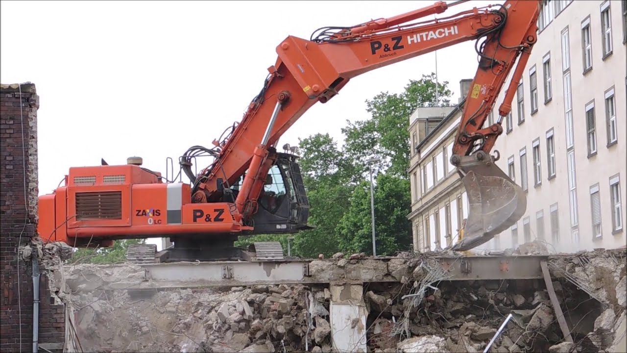 Excavator Hitachi 470 - demolition site -change tools - YouTube