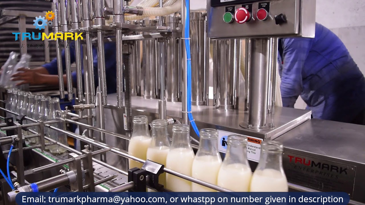 6head Servo driven Milk Filling and Lug capping machine - YouTube