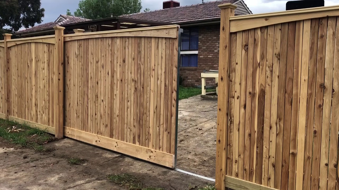 Feature fences with automatic sliding gates by Nailed it Fencing - YouTube