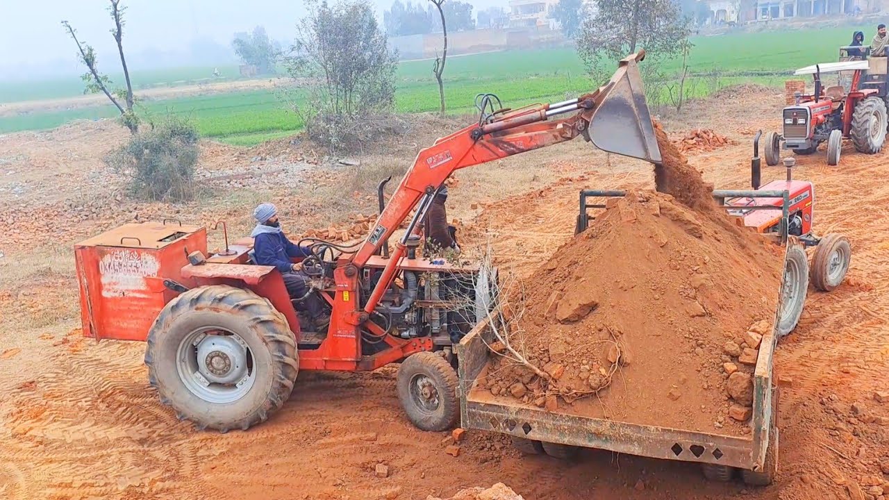 Jcb Caterpillar red Loader Loading Mud in Tractor 🚜 with Trolly - YouTube