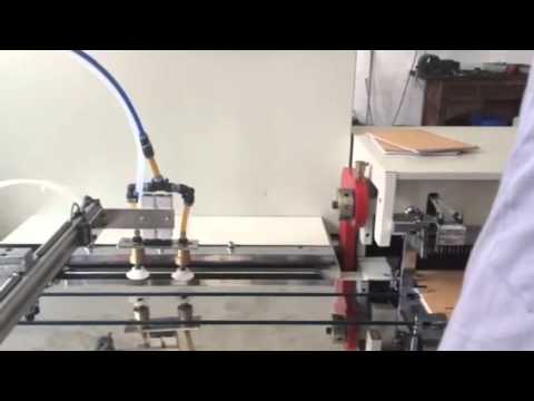 Double loop wire hole punching & coil binding machine - YouTube