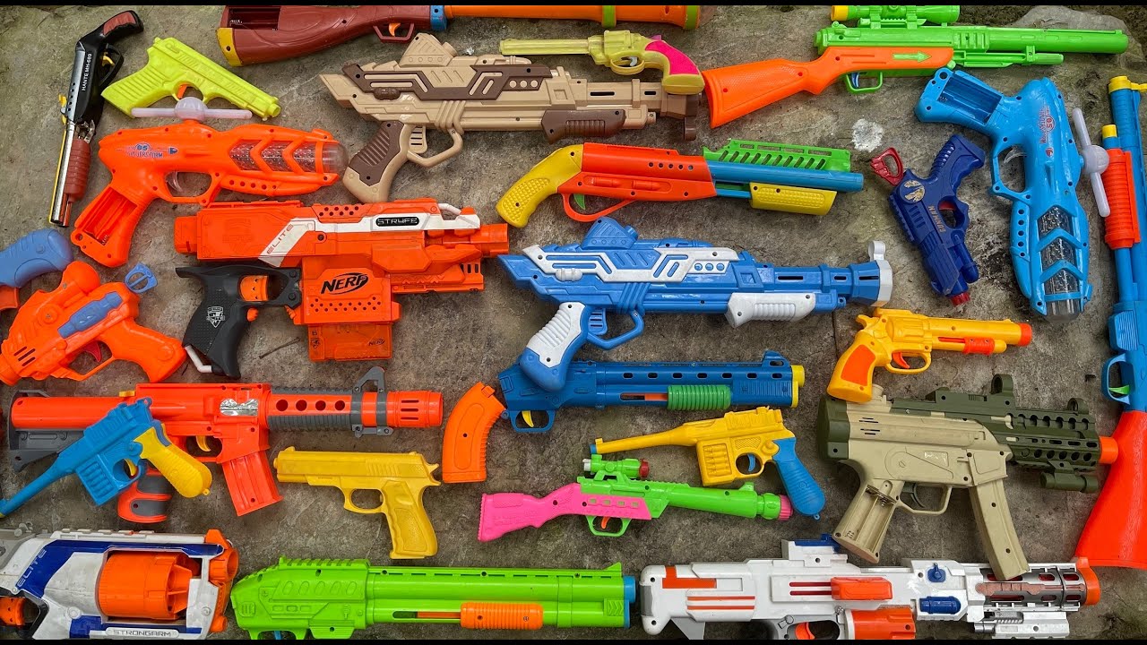 Box of Toy Guns. AK47 Rifles Toys, Metallic Tec 9 Gun, Exploding ...