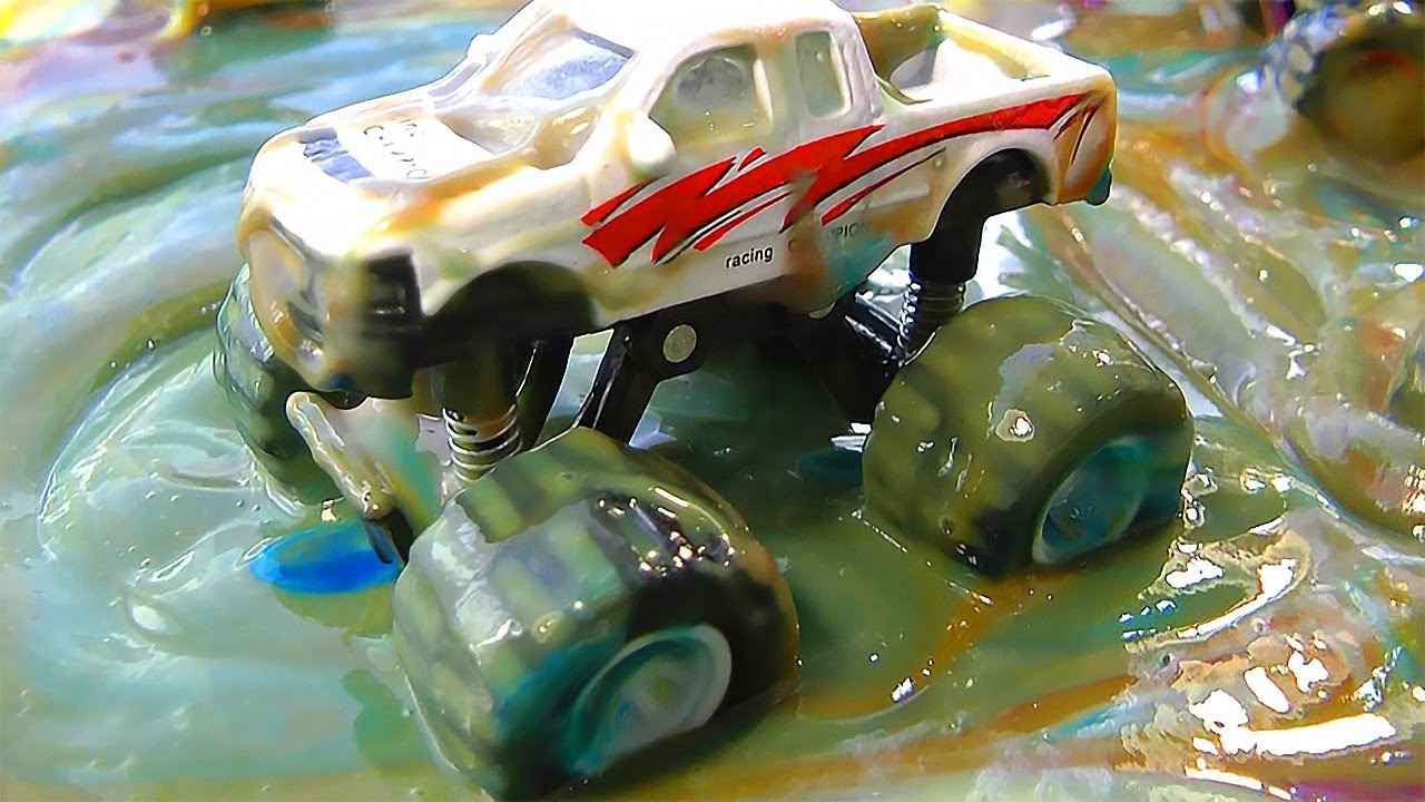 Monster Trucks in the MUD and Colored Slime and Toy Cars - YouTube