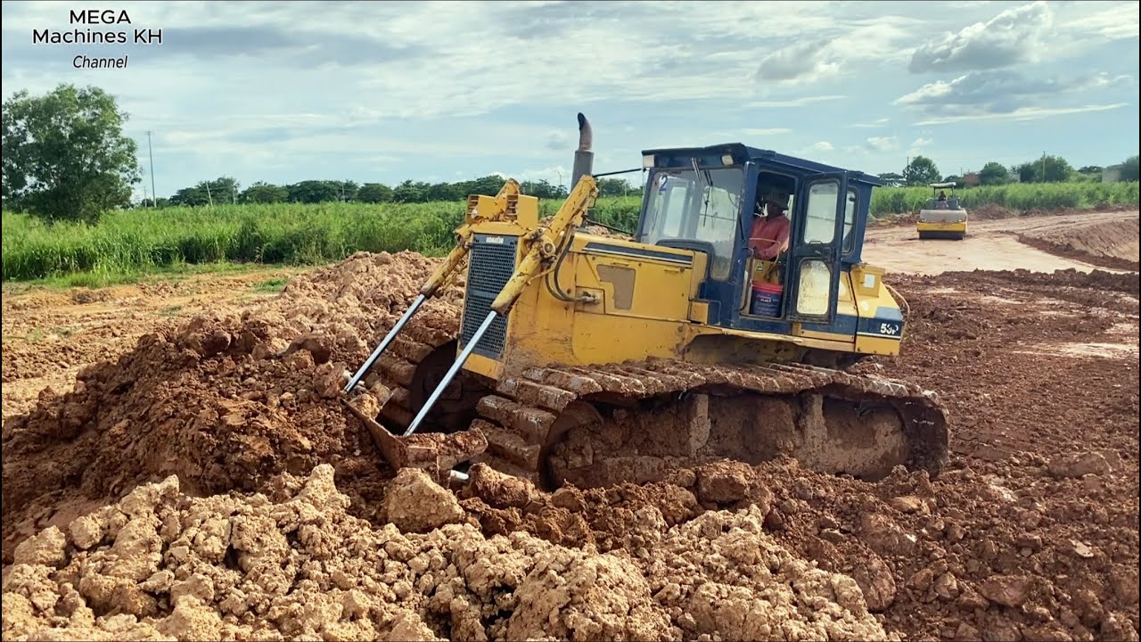 Bulldozer Operation pushing soil with dumptruck from the hole 30m # ...