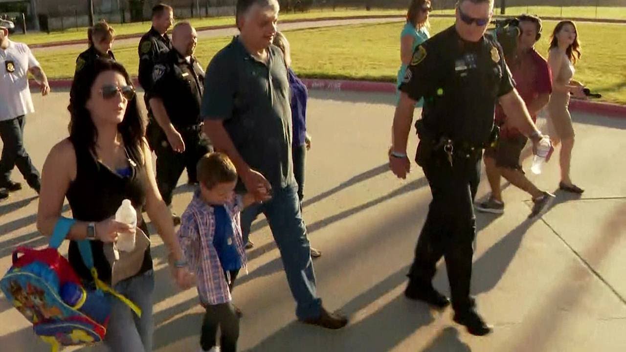 Police escort son of fallen officer to his first day of school - YouTube