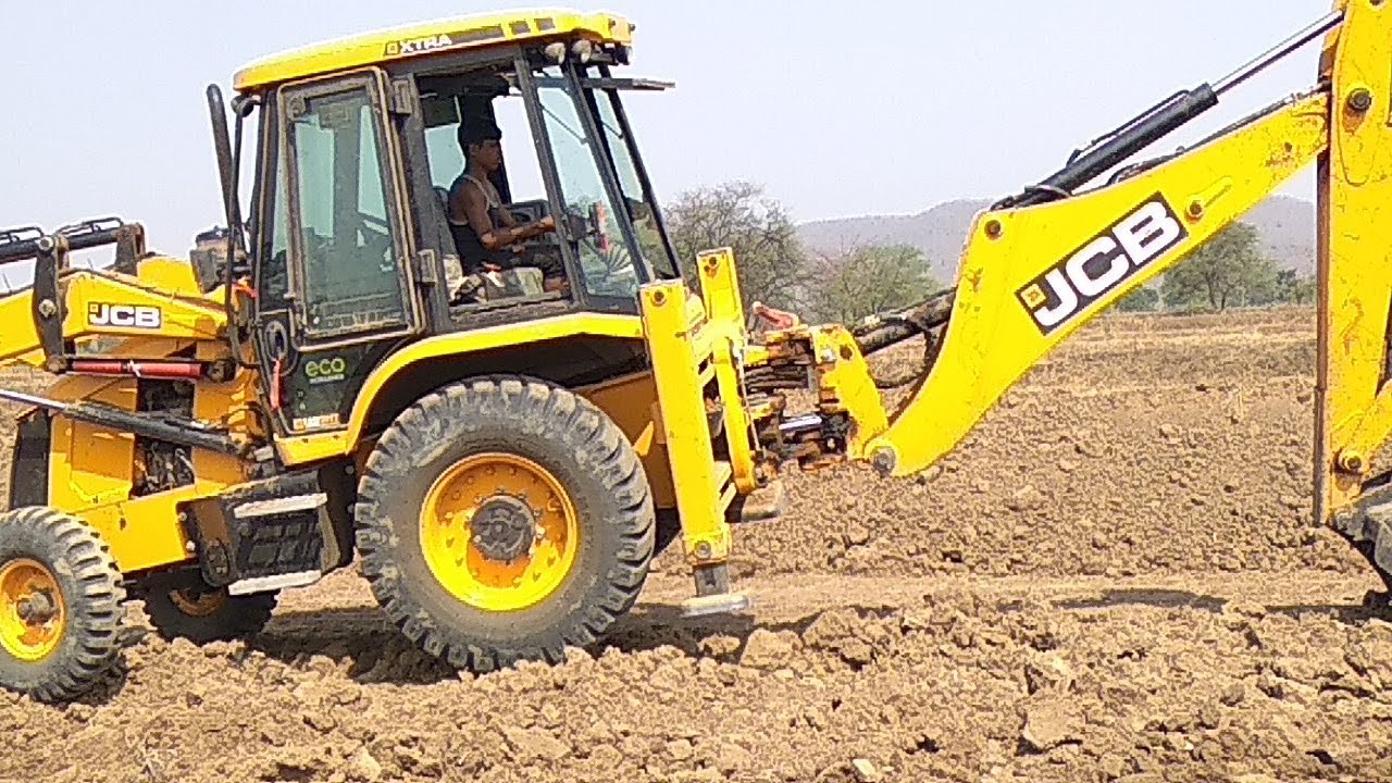 JCB Backhoe Cutting and Mud Loading in Tractor - JCB Machine at Work ...