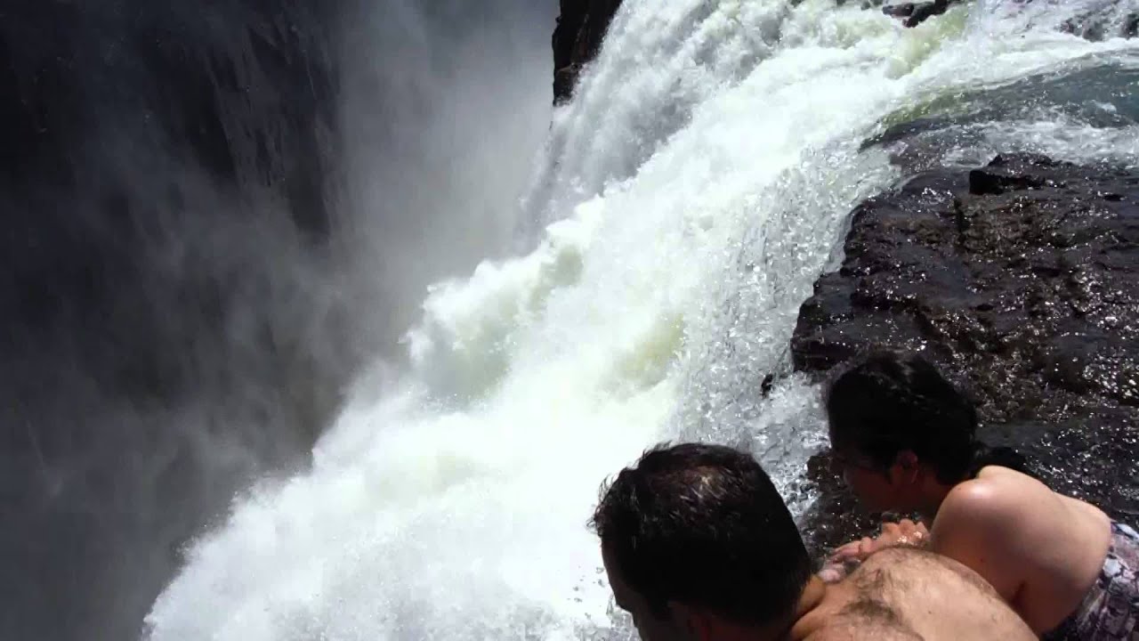 Devils Pool -- Hanging off the edge of a waterfall - YouTube