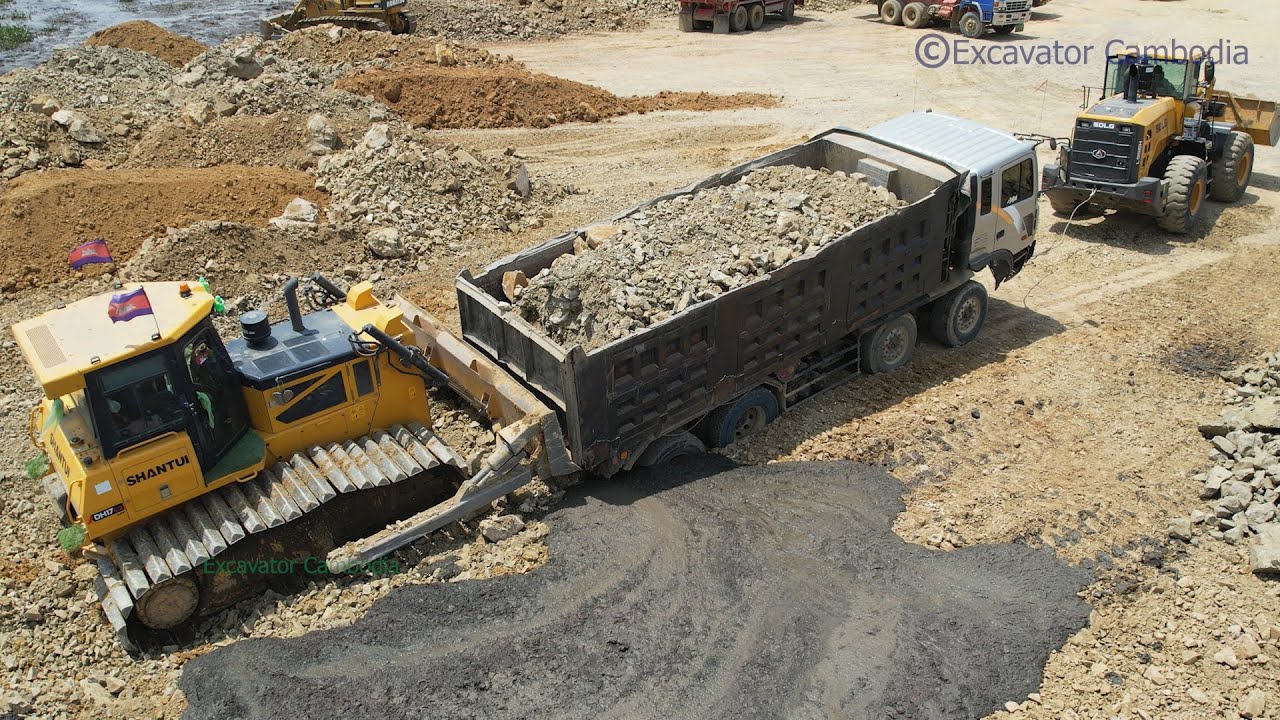 Amazing bulldozer use his power to pushing recovery dump truck stuck mud and wheel loader ...