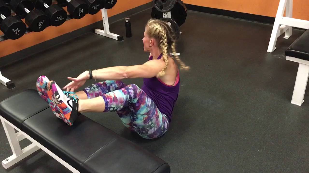 Twisty crunch with feet on bench - YouTube