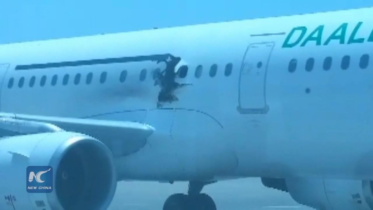 Daallo Airlines A321 damaged by explosion at Mogadishu - YouTube