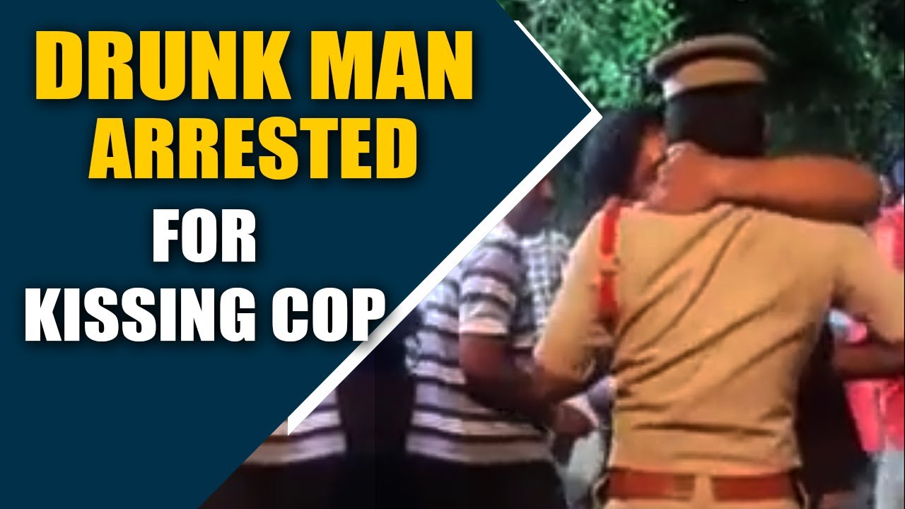Drunk man kisses on duty cop, gets booked: video viral | Oneindia News ...