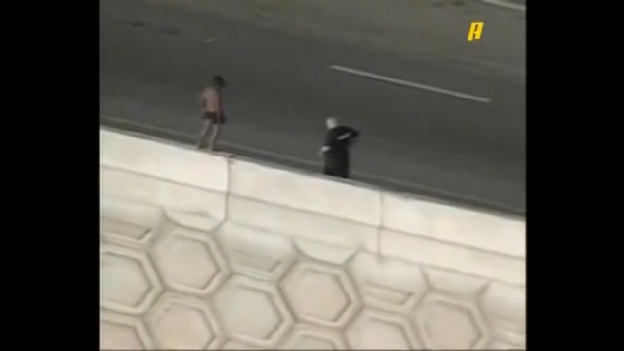 Policeman Saves Man On Overpass Ledge - YouTube