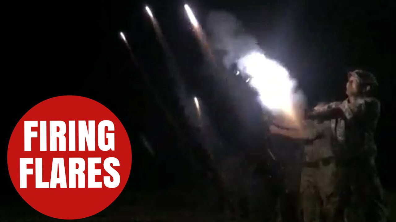 British army deploy flares during night training in stunning video ...