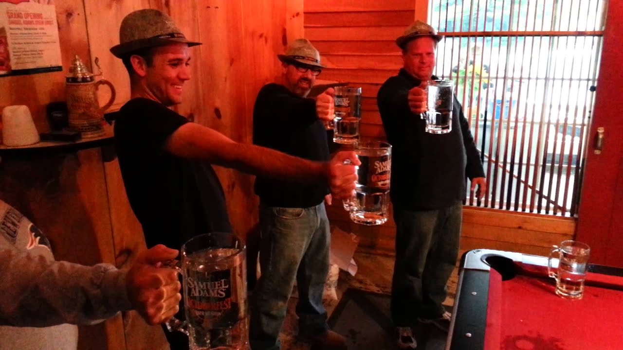 Harald Kachele wins first annual beer stein hoist - YouTube