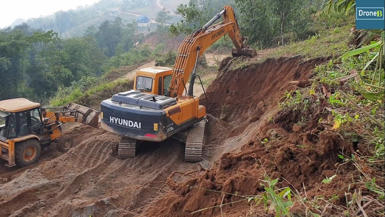 Hyundai Excavator-Backhoe Loader-Mid Hilly Road Construction - YouTube