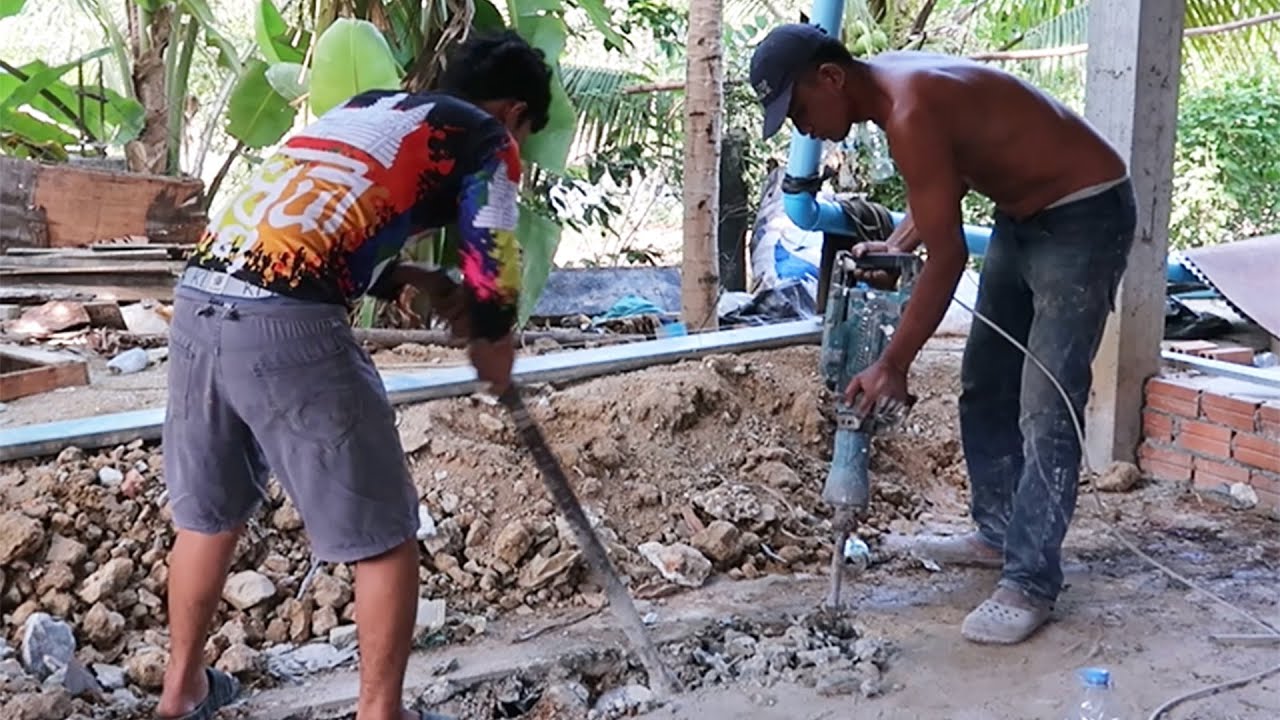 concrete demolition using makita electric jack hammer drill - YouTube