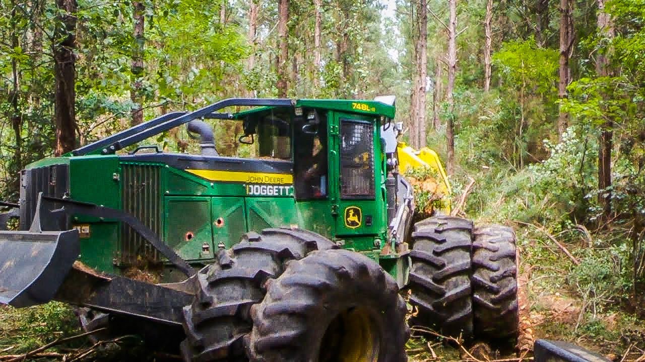 John Deere 748L2 Skidder Pulling Big Drags In Tight Spots - YouTube