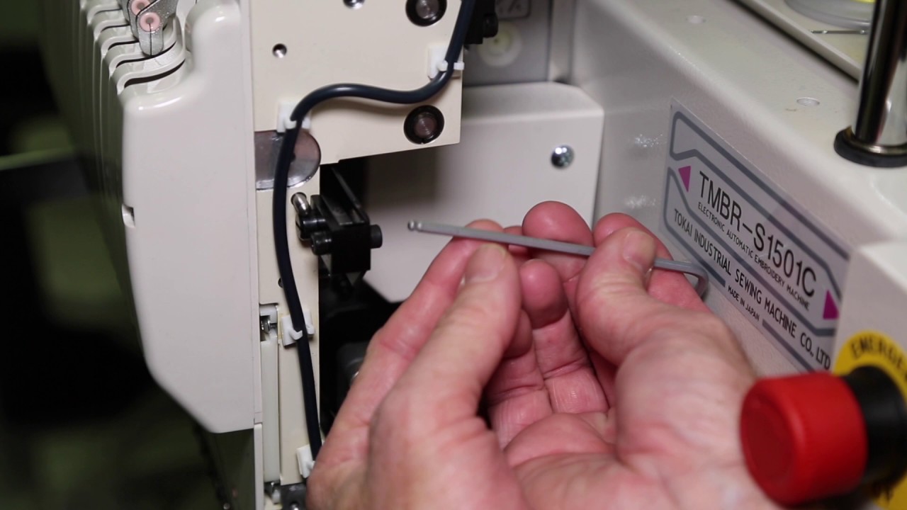 Removal of Shipping Brackets - Tajima Embroidery Equipment - YouTube