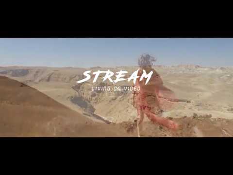 Stream - Living On Video (Official Video) - YouTube