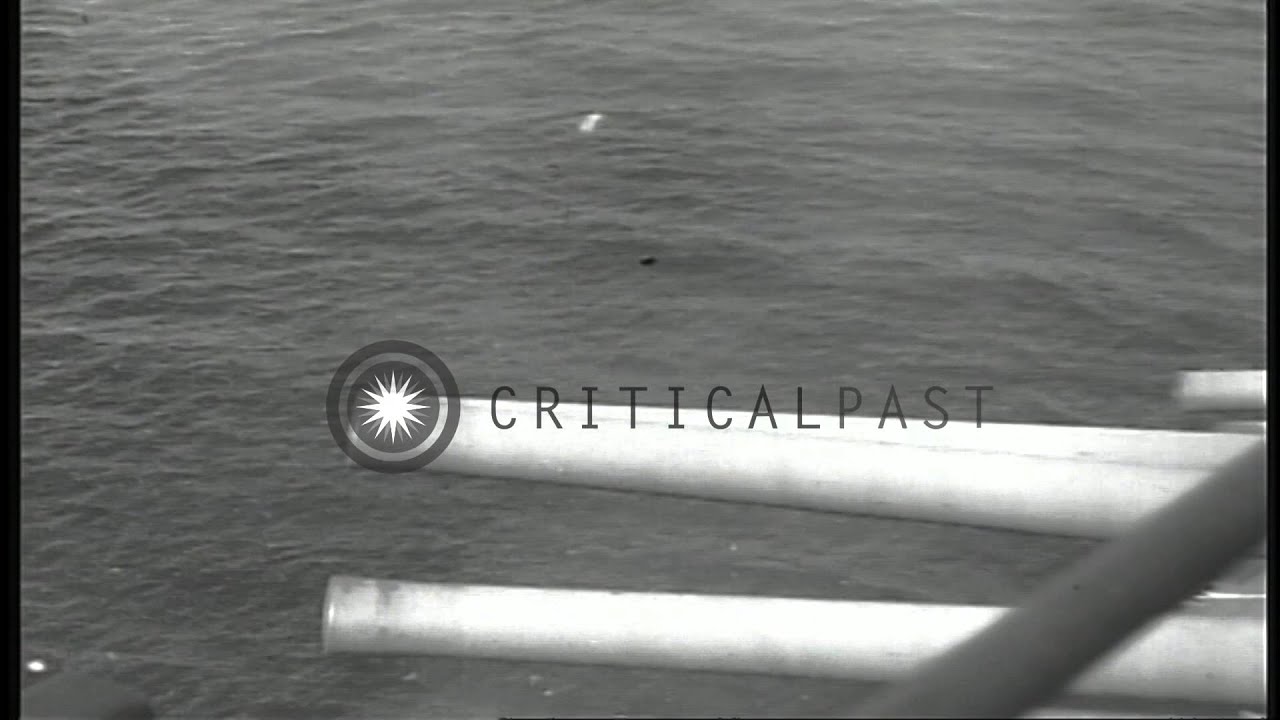 US Naval warships shell Mariana Islands during World War II HD Stock ...