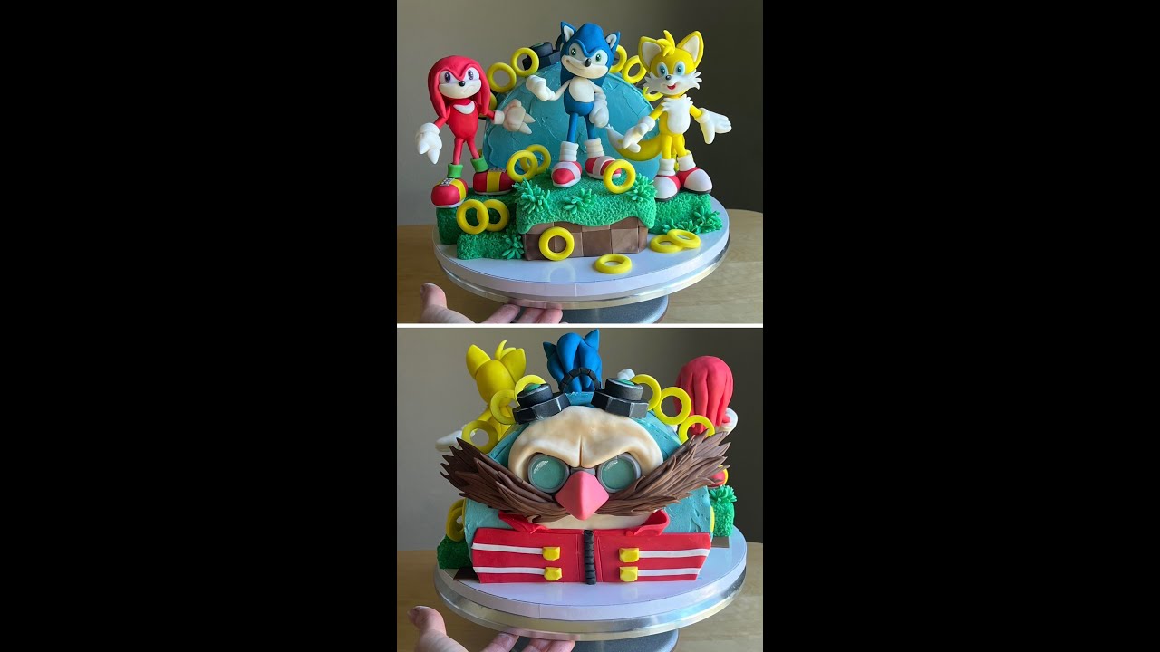 Sonic cake decorating with fondant toppers and 2d character on the back ...