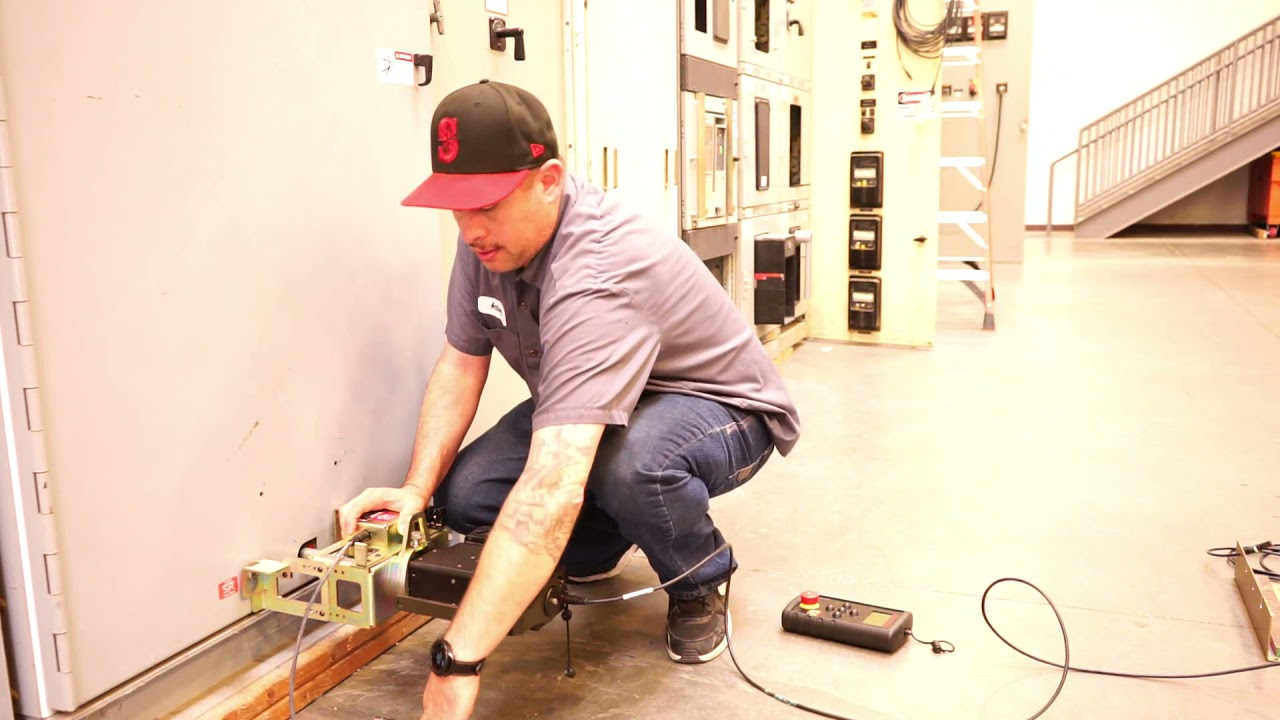 Remote racking a Siemens GMI 15k V breaker - YouTube