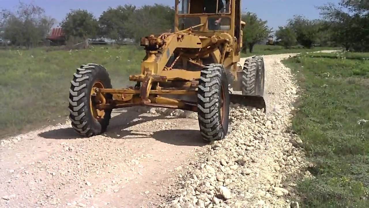 CAT 12 Motorgrader grading road [HD 720p] - YouTube