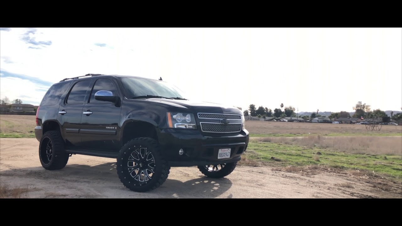2007 Tahoe on 22x12 with that Cali lean - YouTube