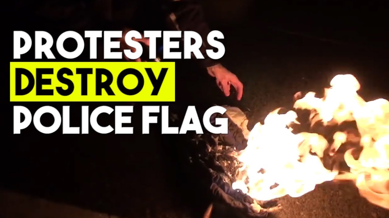 Protesters Desecrate Thin Blue Line Flag - YouTube